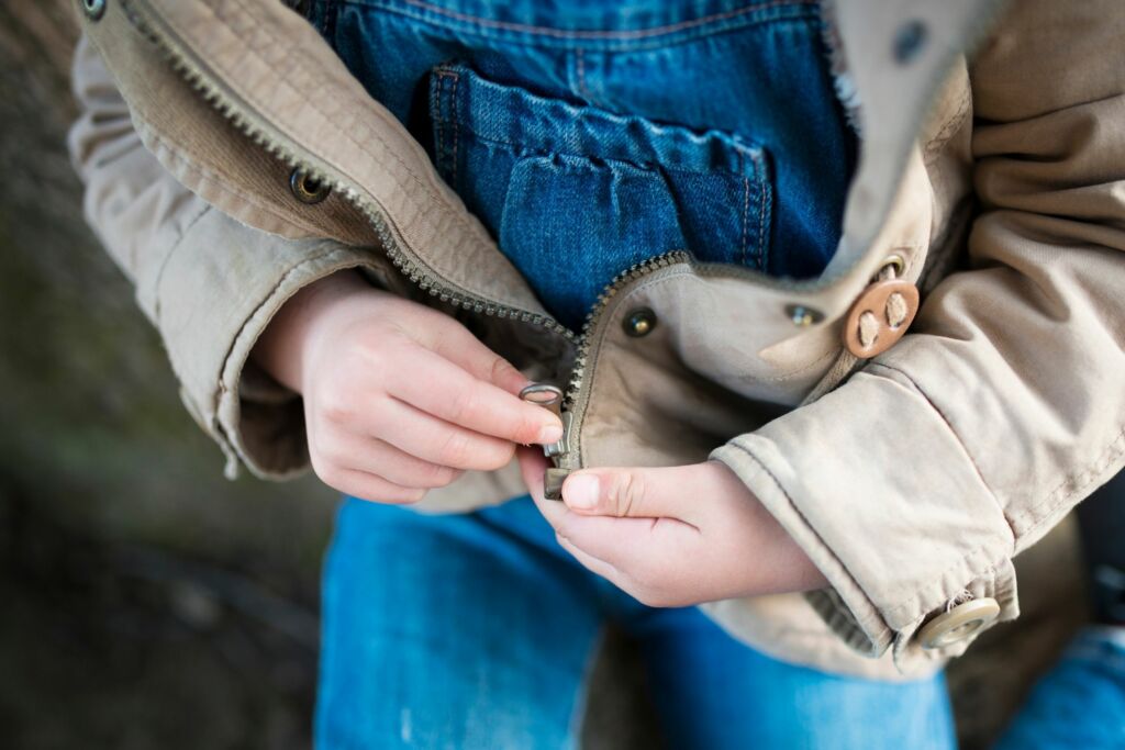 Zip It! Occupational Therapy Tips on Learning to Button & Zip - Focus ...